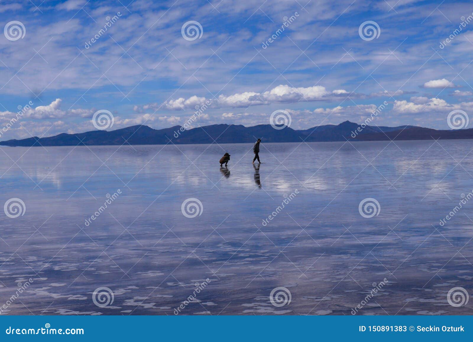 People Silhouette in the Salar De Uyuni Stock Image - Image of cloud ...
