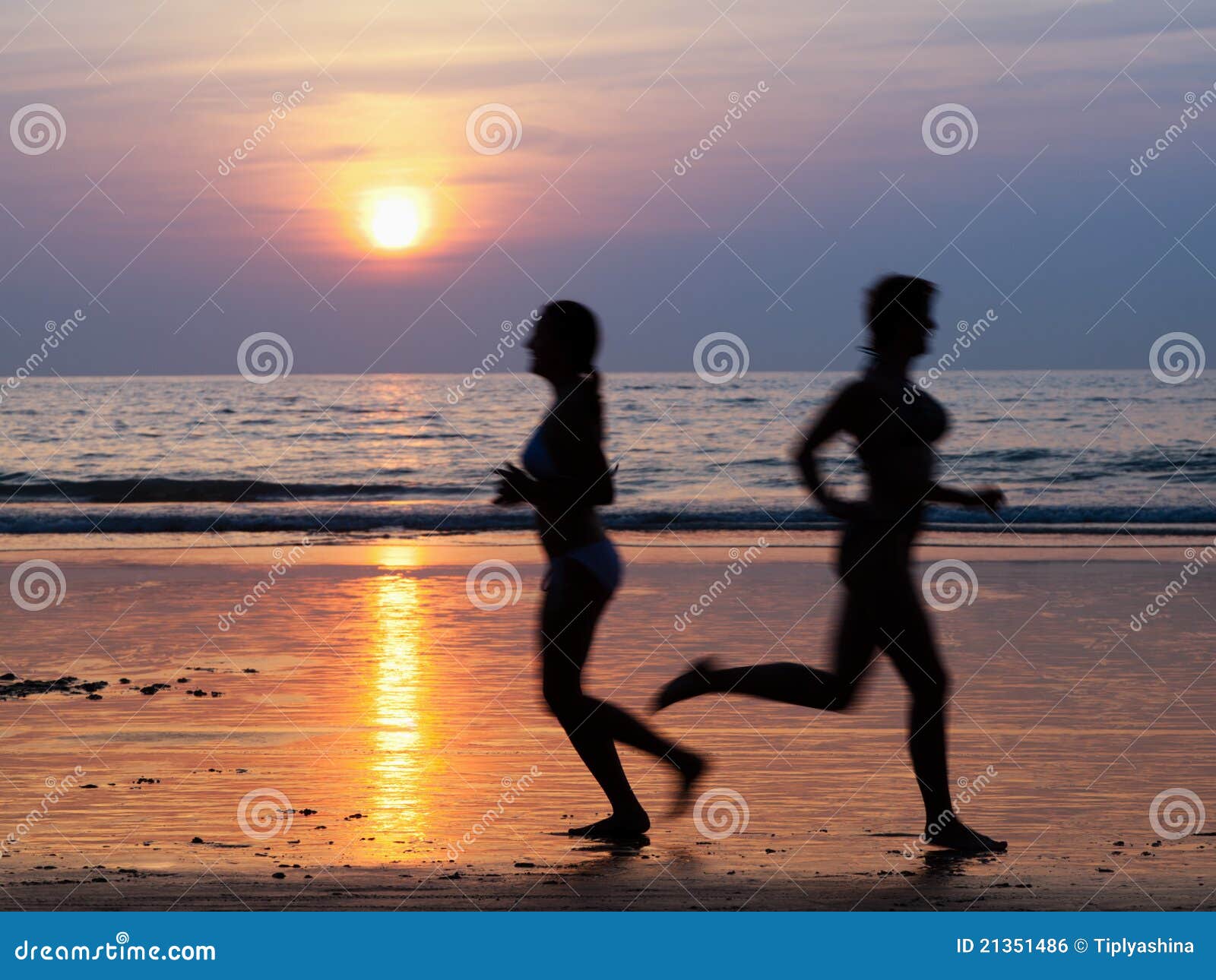 People Silhouettes Running by the Ocean at Sunset Stock Photo - Image ...