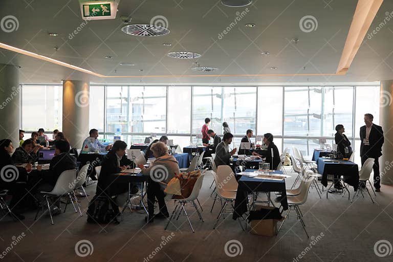 People Sitting at Discussion Tables Editorial Photography - Image of ...