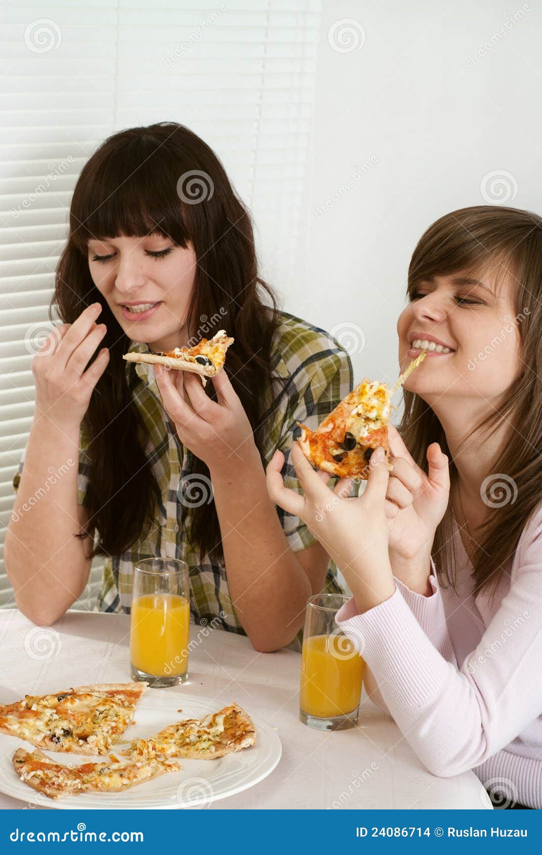 People Sitting Eating Pizza Stock Photo - Image of attractive ...