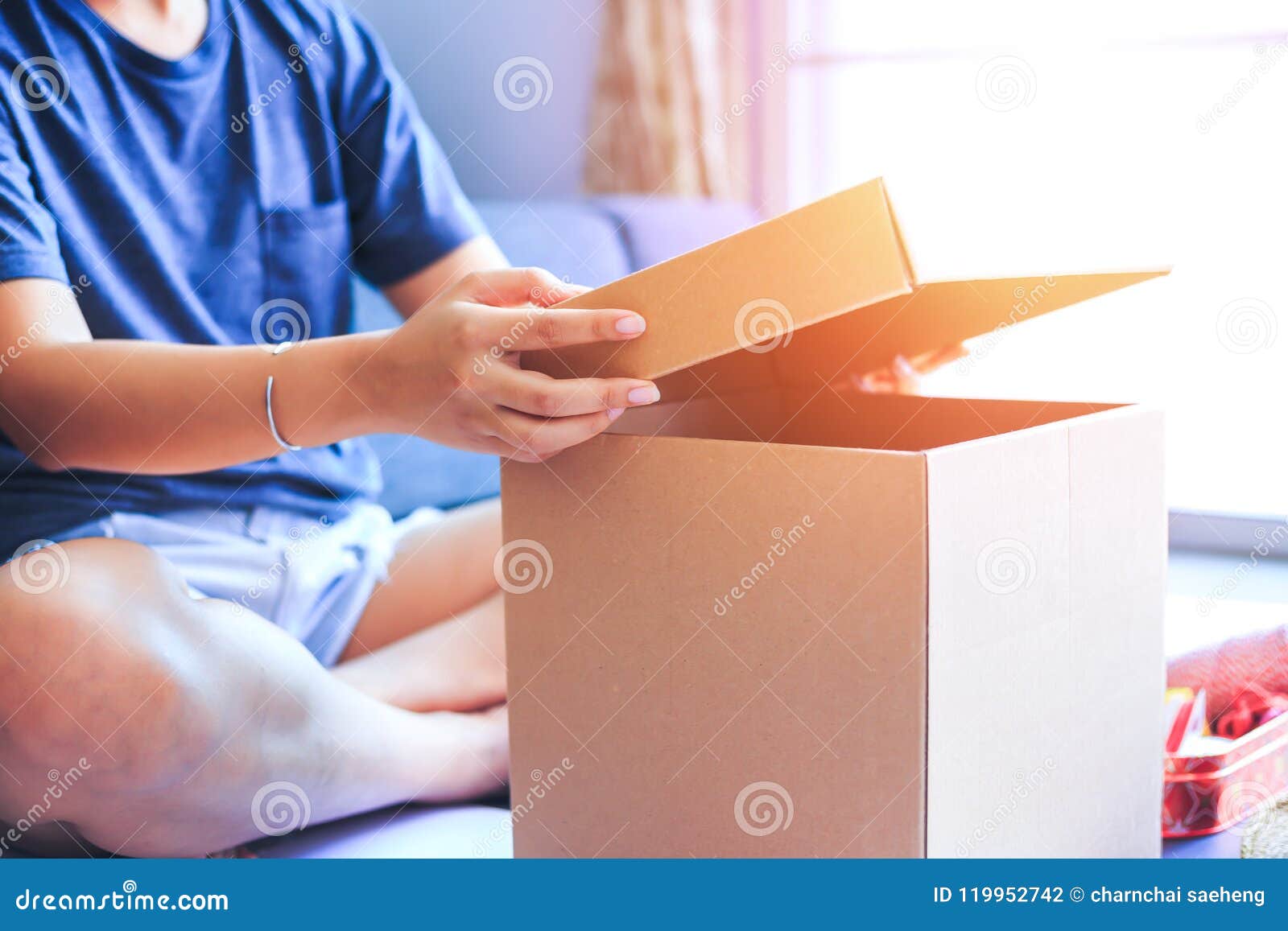 People Sitting Open the Box in the Room. Stock Photo - Image of pack ...
