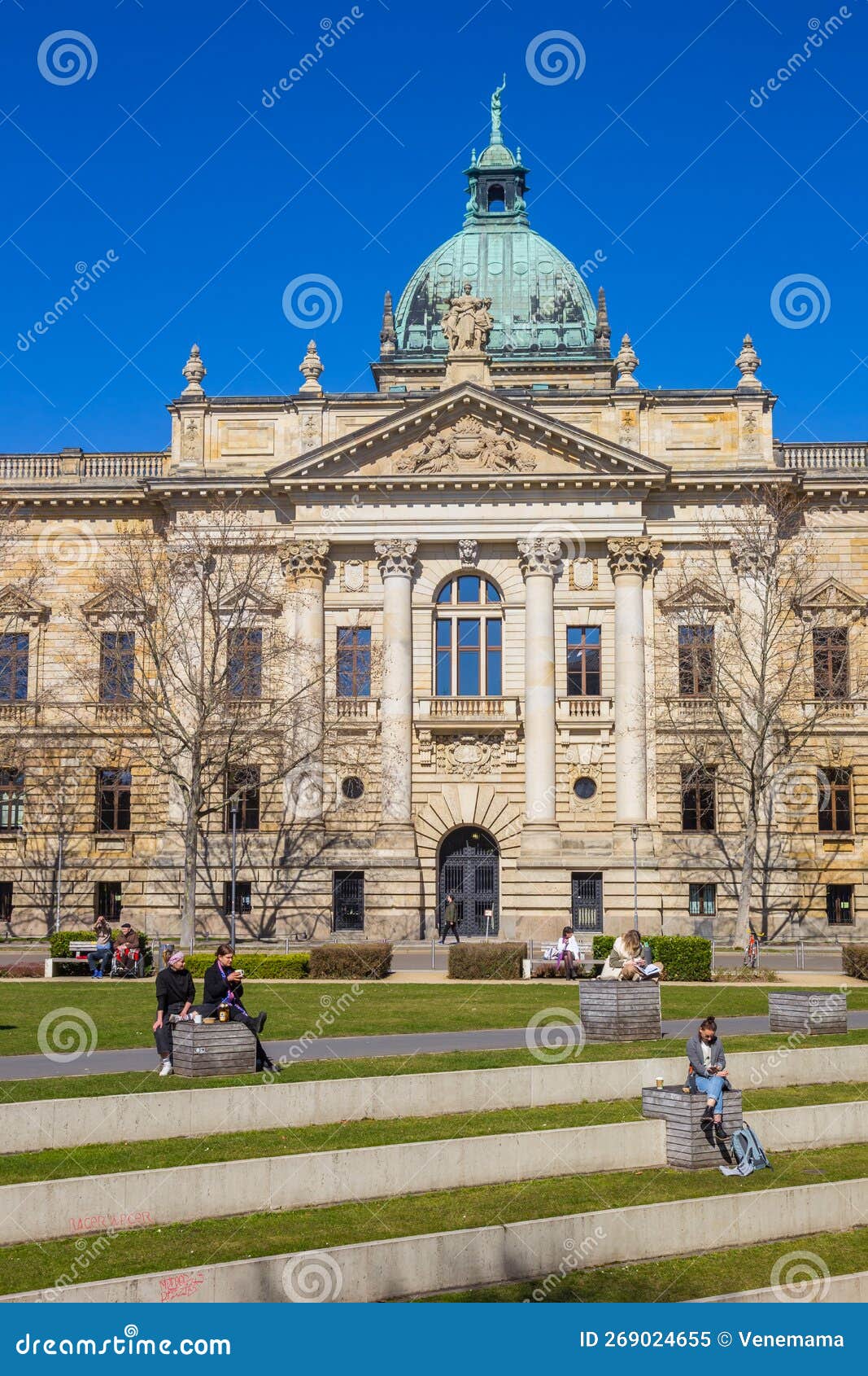 People Sitting in the Sun in Front of the Courthouse in Leipzig ...