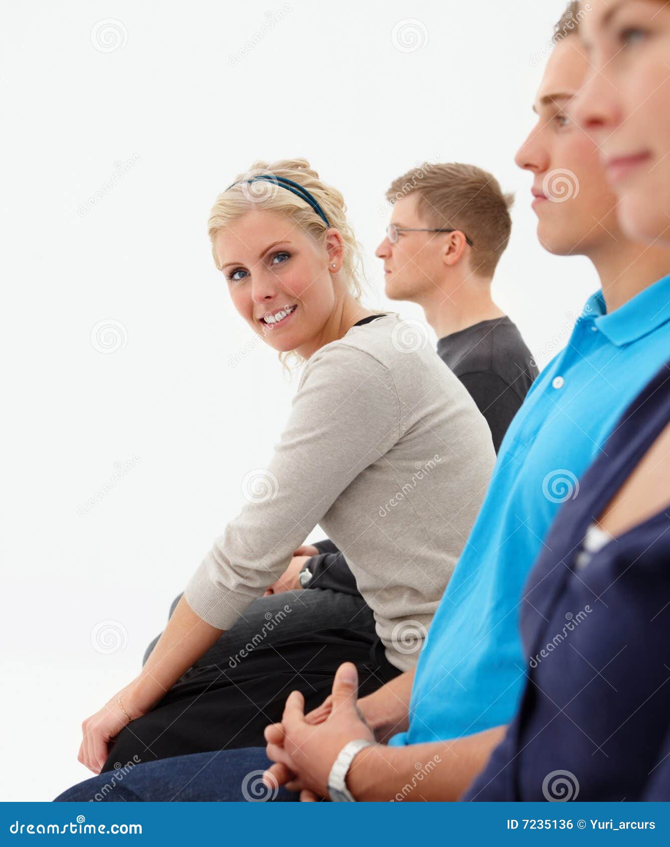 People Sitting and Waiting in Line Stock Photo - Image of girl, closeup ...