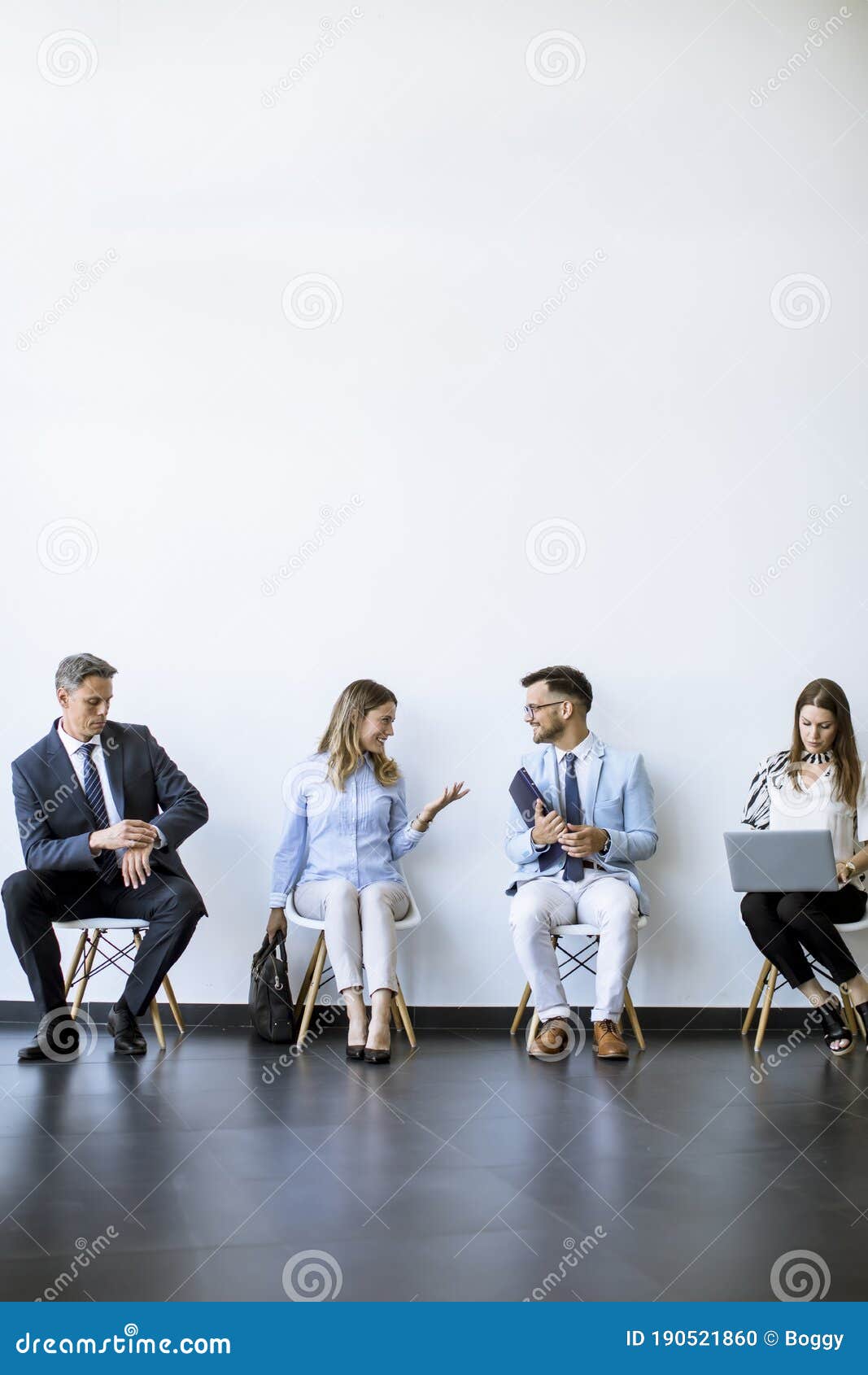 People Sitting in the Waiting Room before an Interview Stock Photo ...