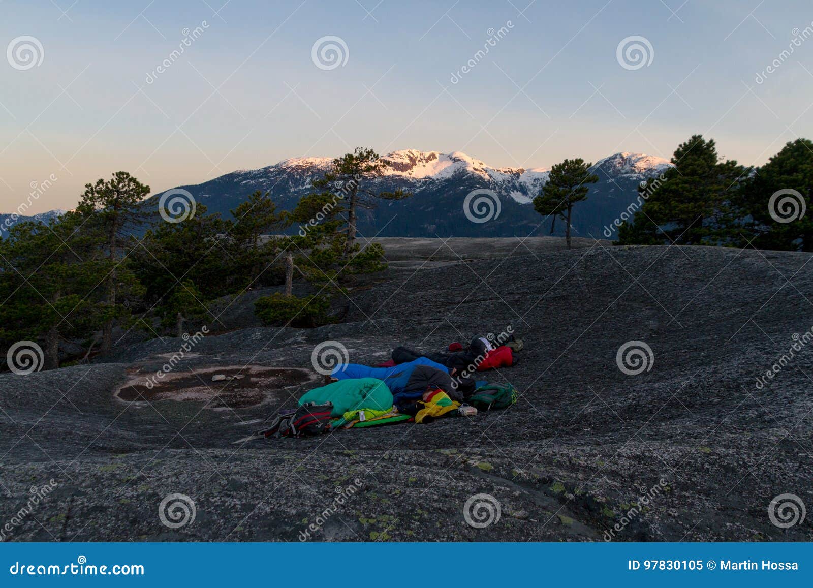 People Sleeping on the Top of Mountains while Sunrise Stock Image ...