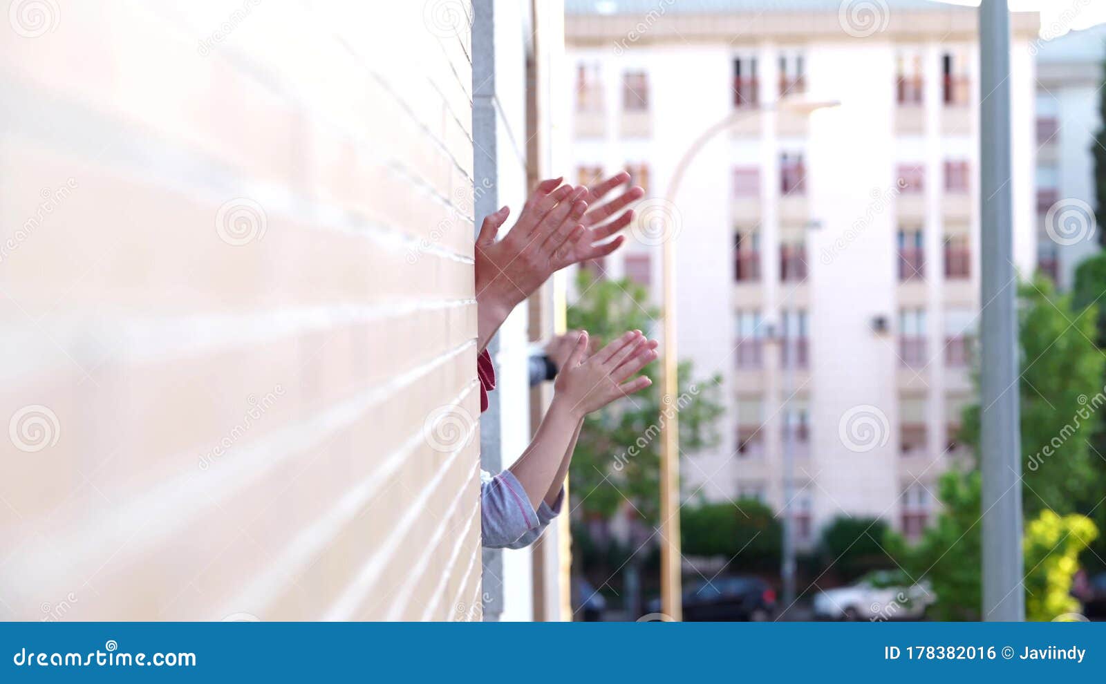 People Clapping in the Window in Support of People Who Fight Against ...