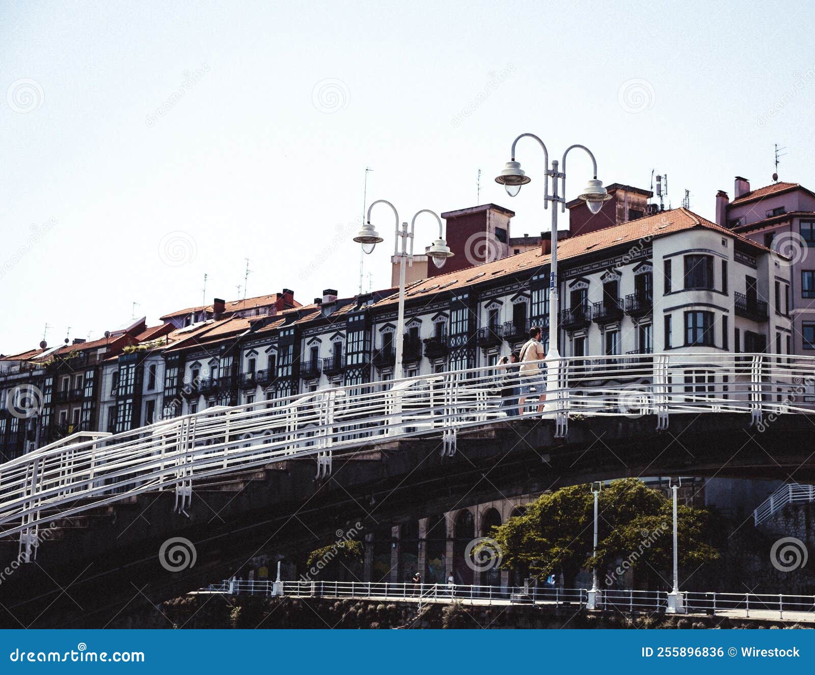 People Standing on the Bridge Stock Photo - Image of river, street ...