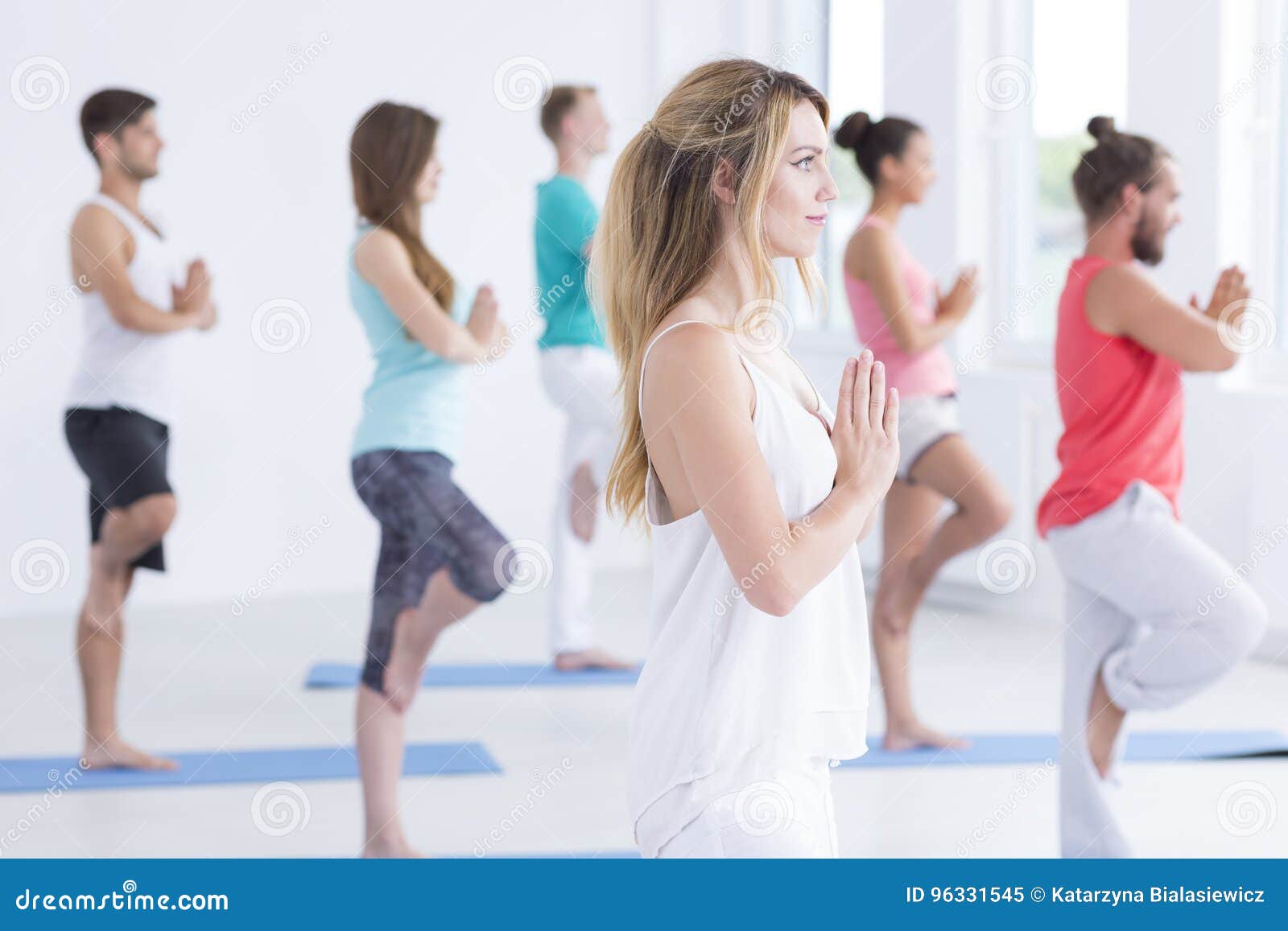 People standing on one leg stock image. Image of foam - 96331545