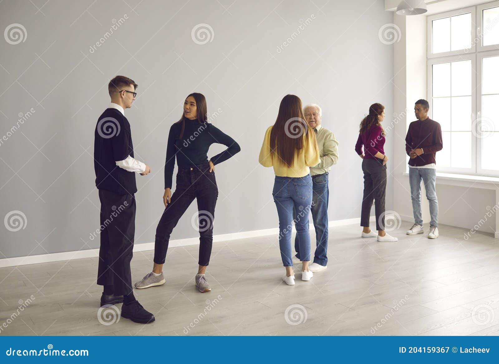 People Standing in Pairs and Getting To Know Each Other in Group ... People Standing in Pairs and Getting To Know Each Other in Group ...
