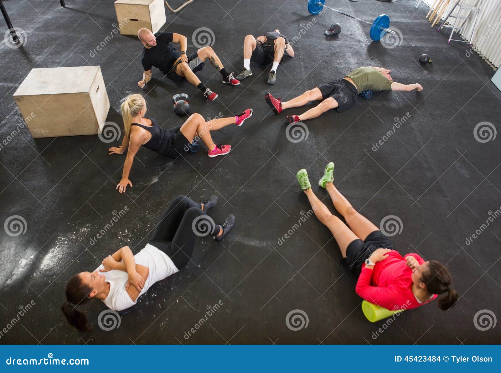 People Stretching in Cross Training Box Stock Photo - Image of angle ...