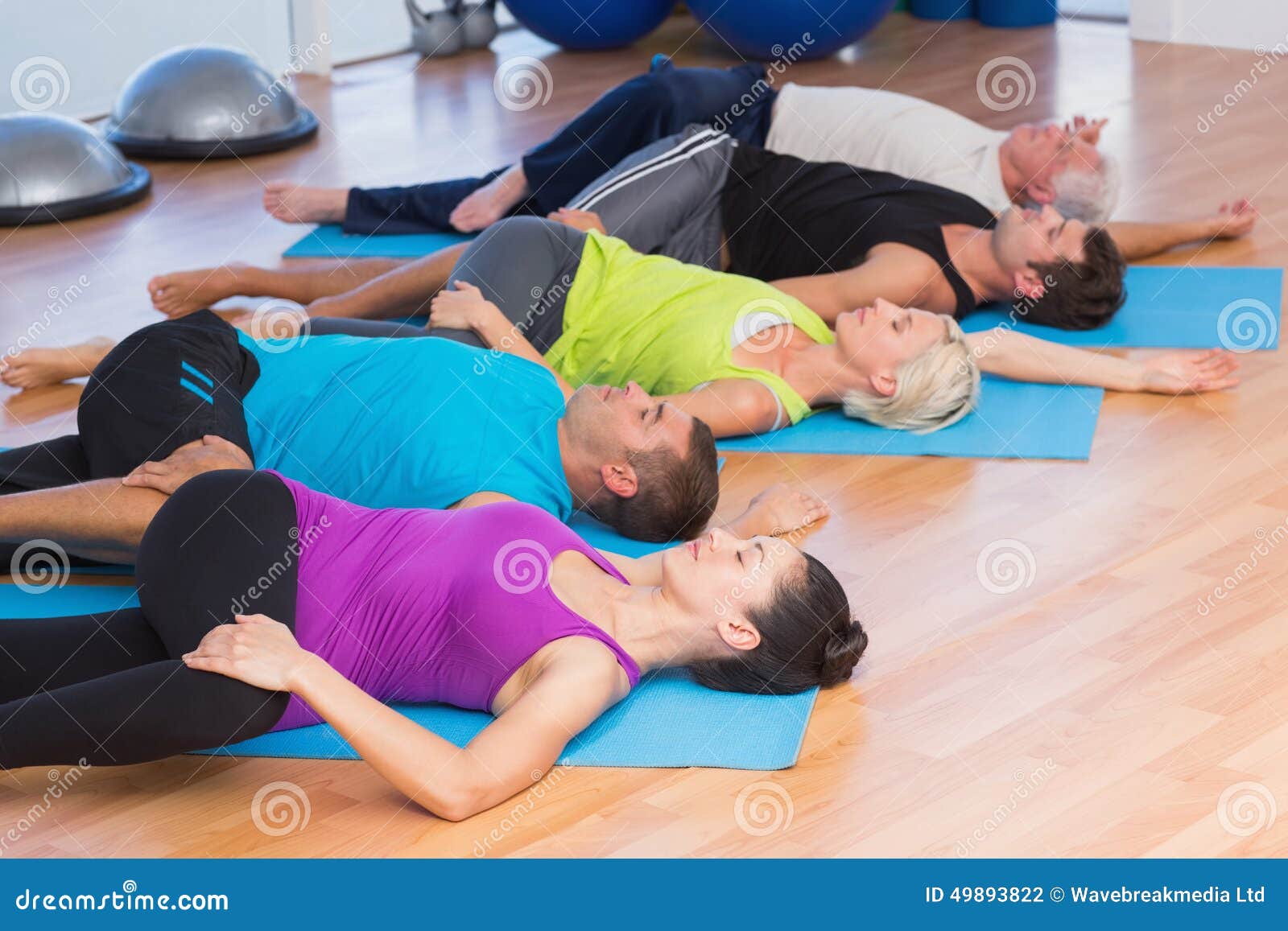 People Stretching Legs in Fitness Studio Stock Photo - Image of fitness ...