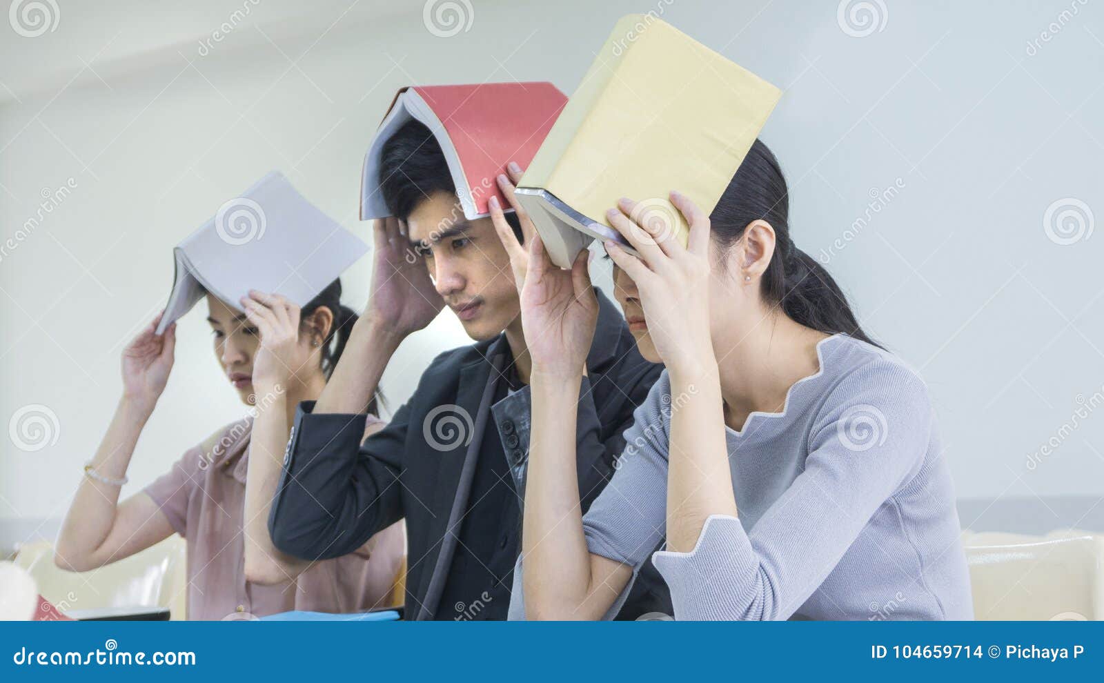 People Student Read Book and Hold Over Head and Sit Lecture Chairs ...