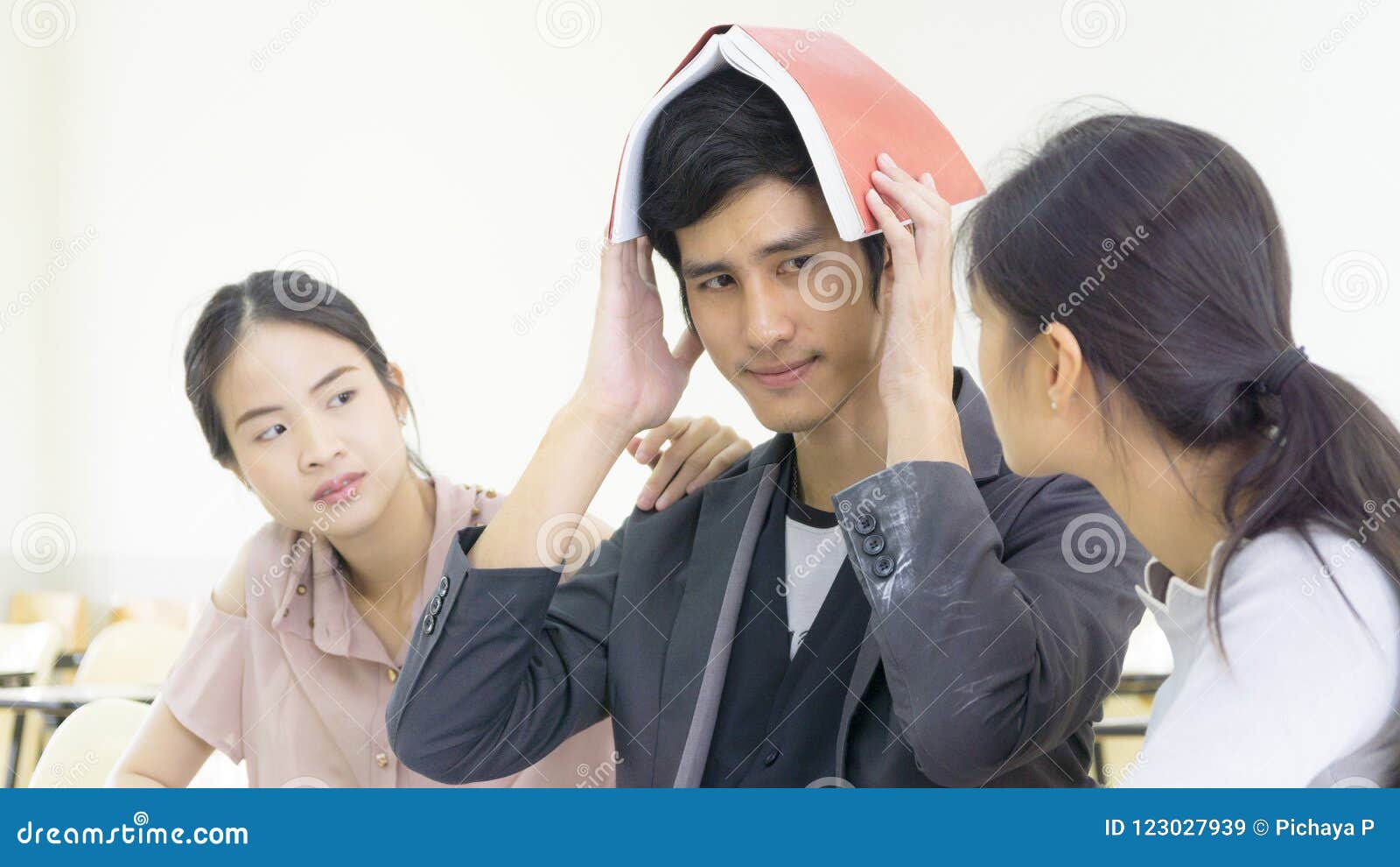 People Student Read Book and Hold Over Head and Sit Lecture Chairs ...