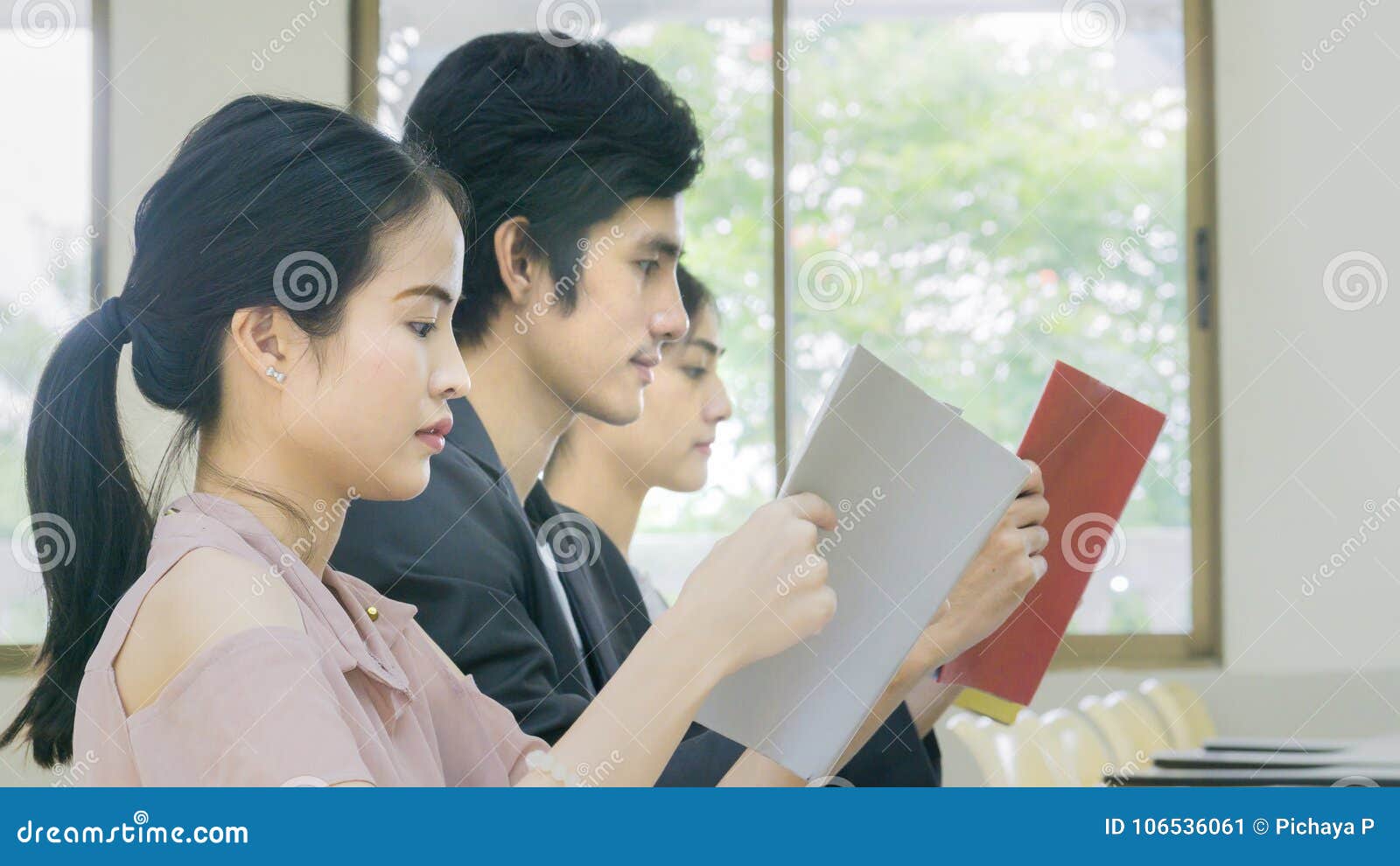 People Student Read Book and Sit in Lecture Chairs Stock Image - Image ...