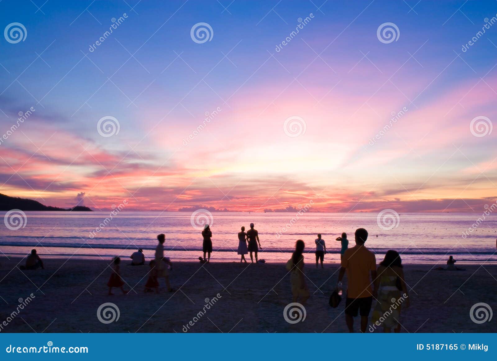 People on sunset beach stock image. Image of idyllic, adult - 5187165