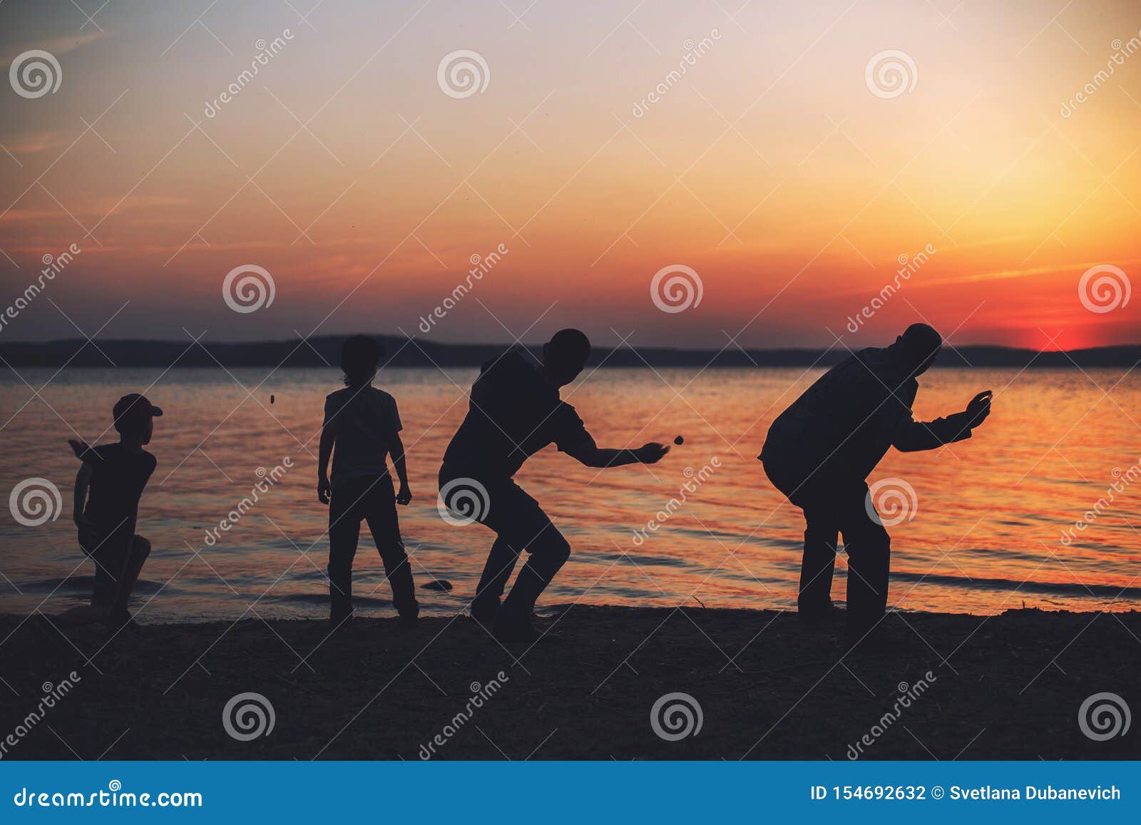 People Throwing Stones into the Wat Stock Photo - Image of back, father ...