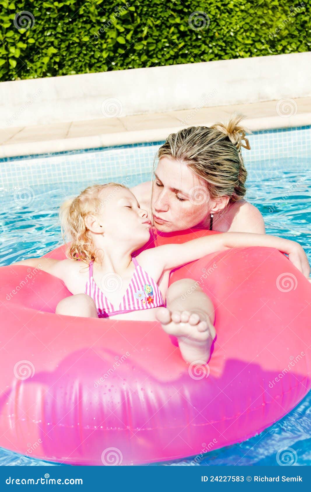 People in swimming pool stock image. Image of motherhood - 24227583
