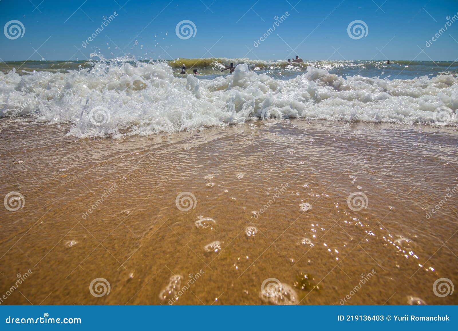 People Swimming in the Rough Sea. View from the Sandy Beach Stock Image ...