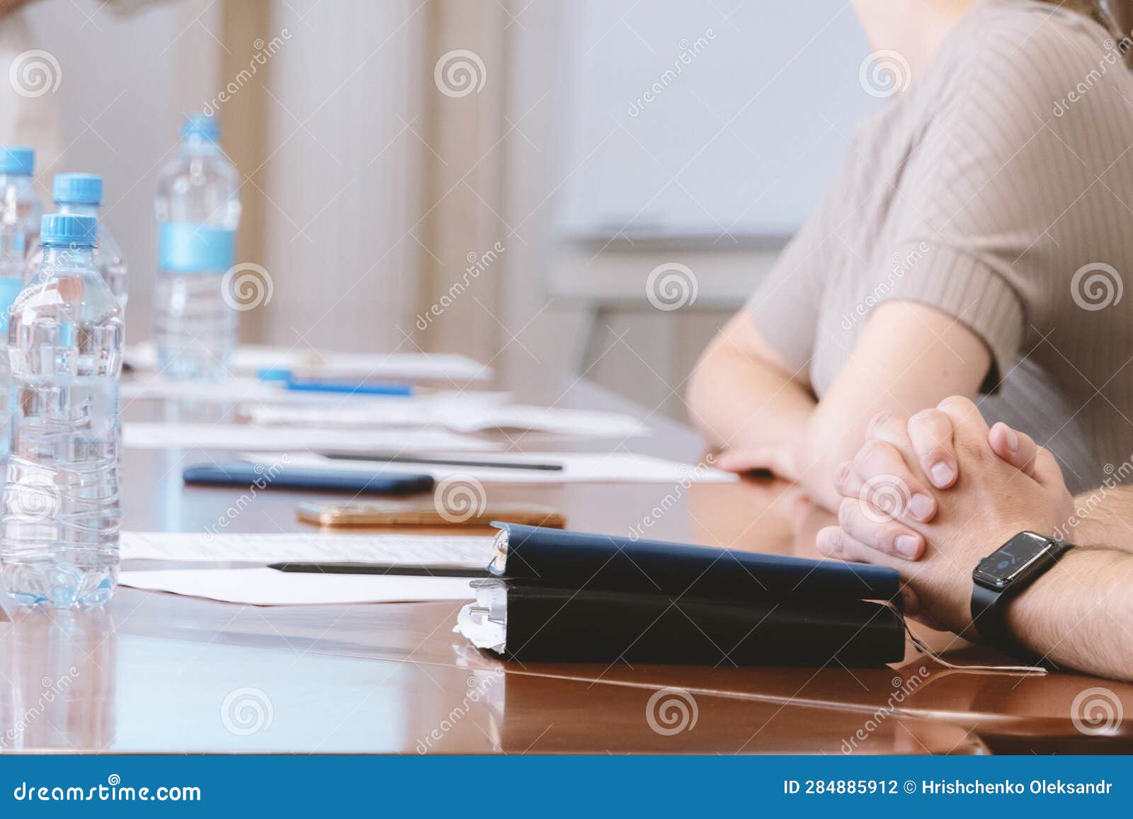 People at the Table are Discussing Various Issues. Emphasis on Hands ...