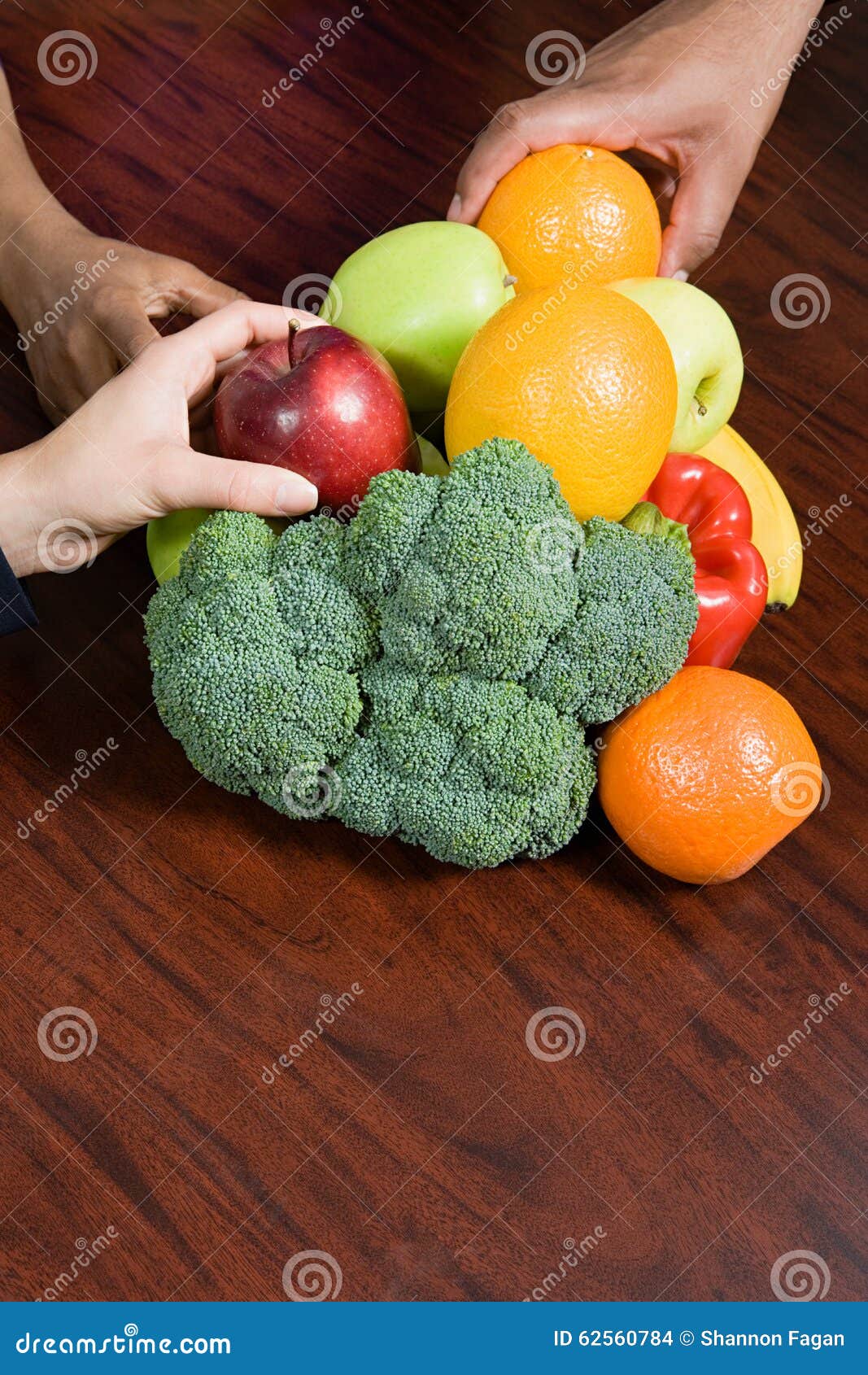 People Taking Fruit from Table Stock Photo - Image of diet, holding ...