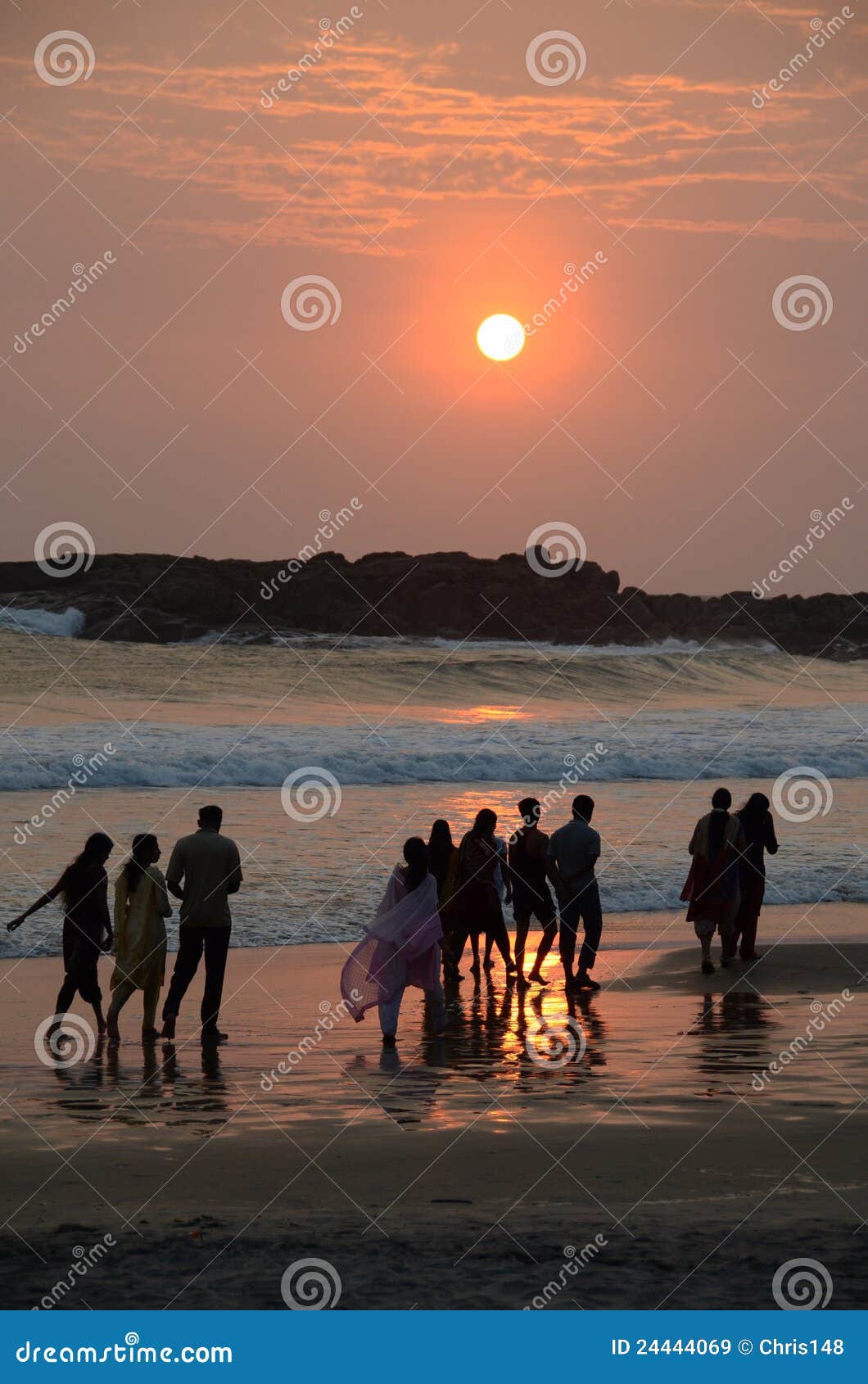 People Taking Sunset Stroll on Beach Stock Image - Image of stroll ...