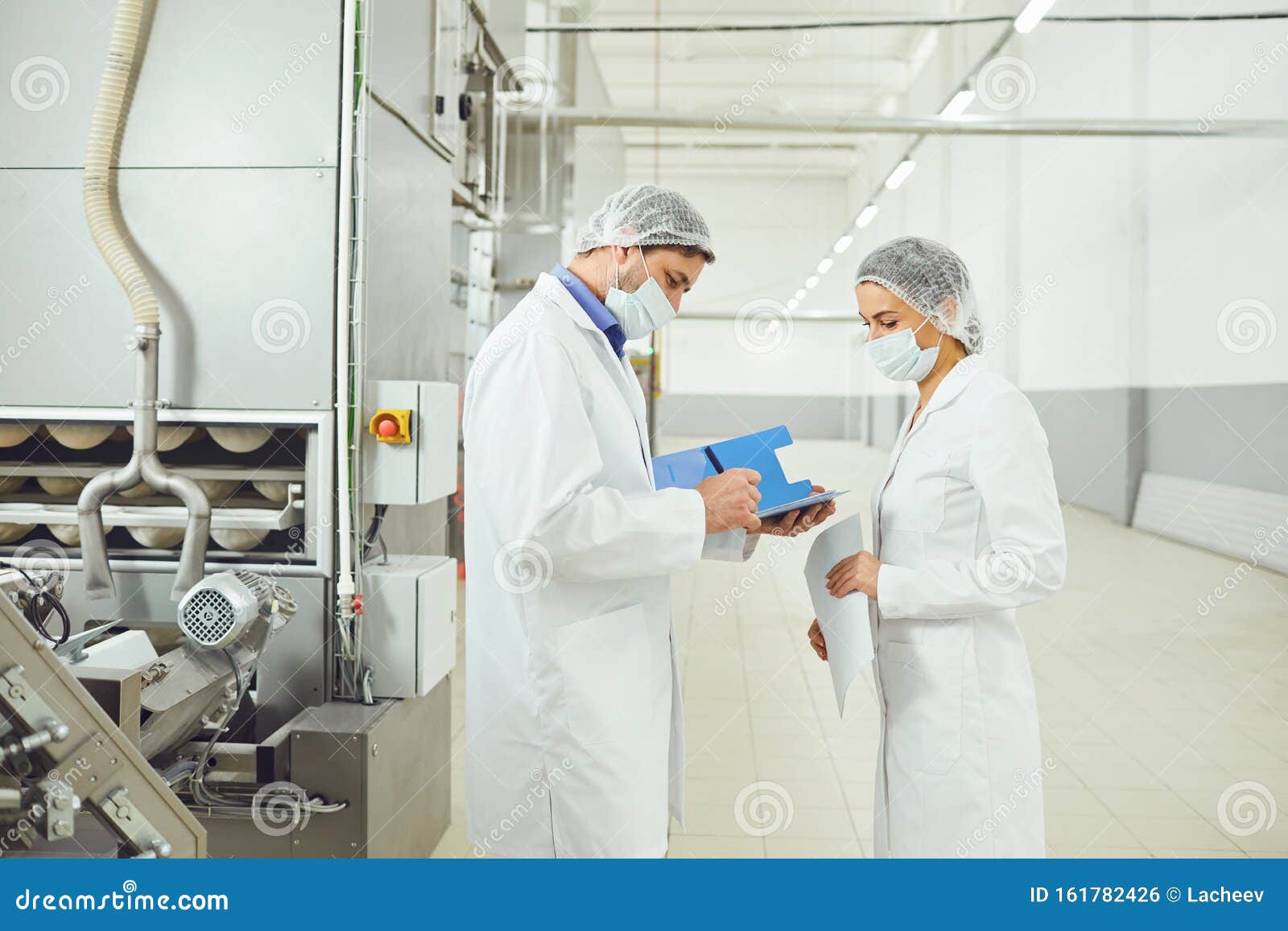 Technologists Inspector in Masks at Food Factory. Stock Photo - Image ...