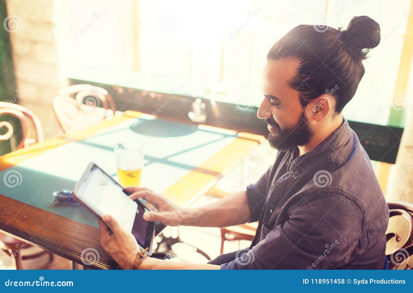 Man with Tablet Pc Drinking Beer at Bar or Pub Stock Photo - Image of ...
