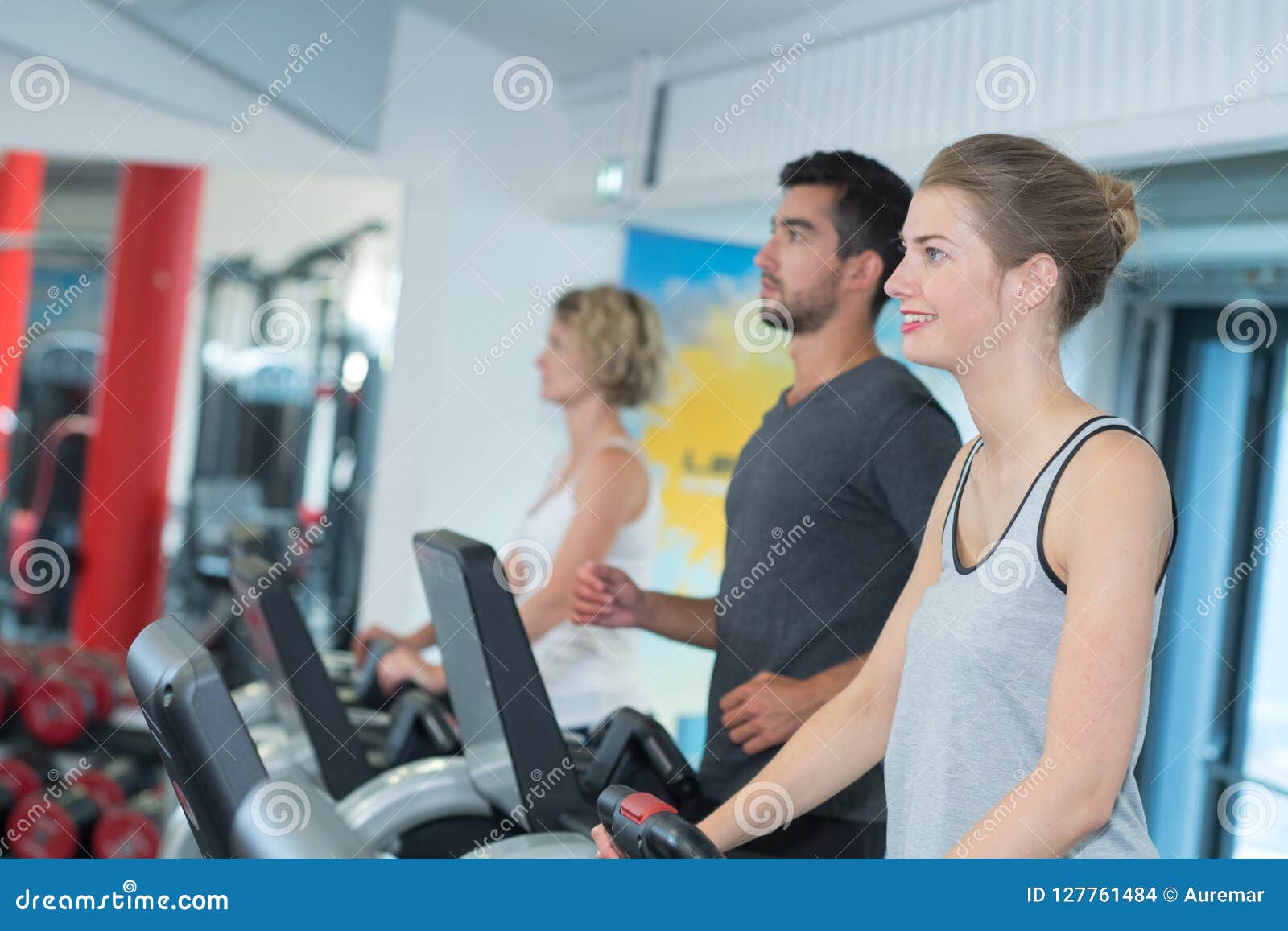 People Using Exercise Machines in Gym Stock Photo - Image of clean ...