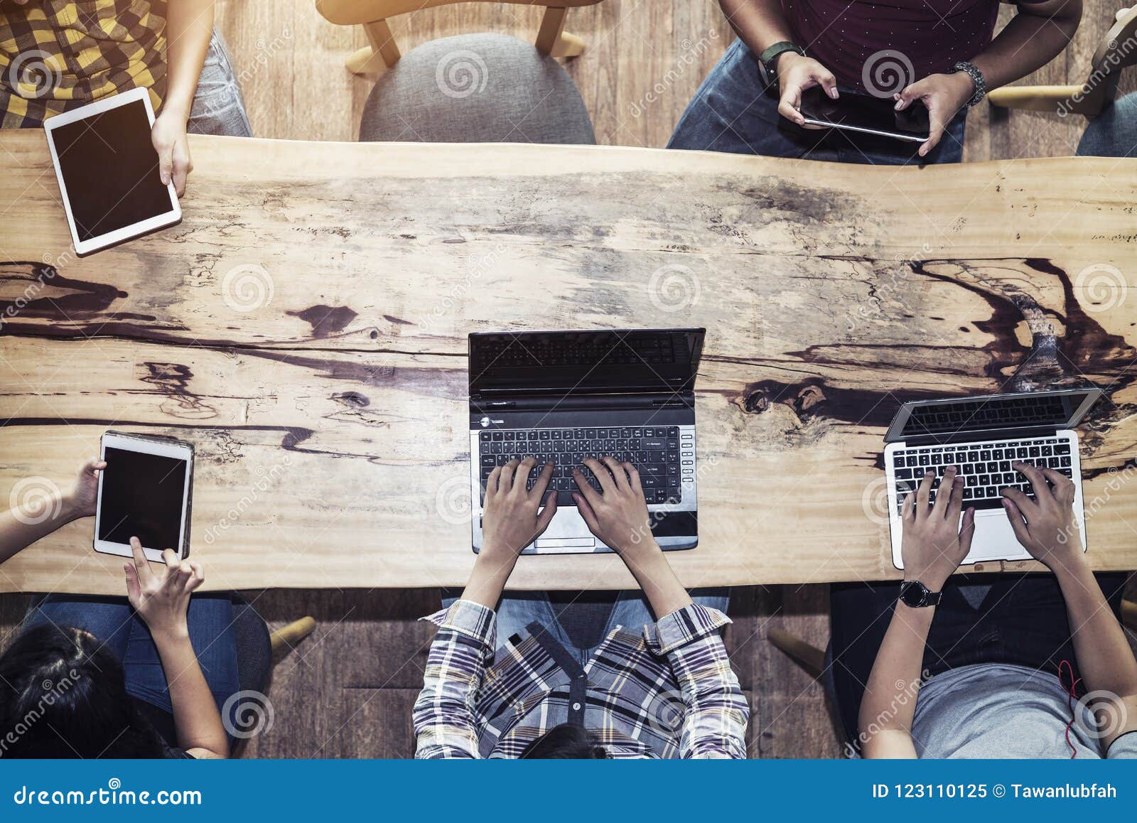 People Using Gadget To Working on Table. Network Connection Tech Stock ...