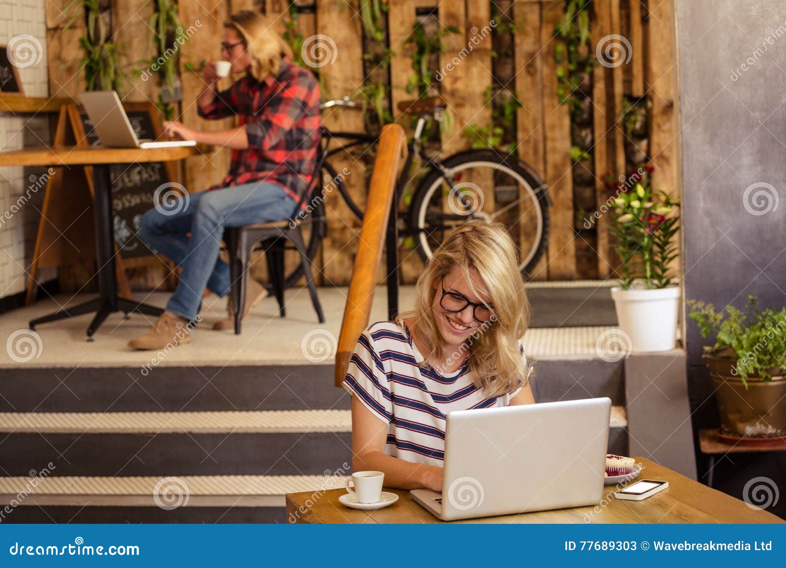 People using laptops stock image. Image of drink, casual - 77689303