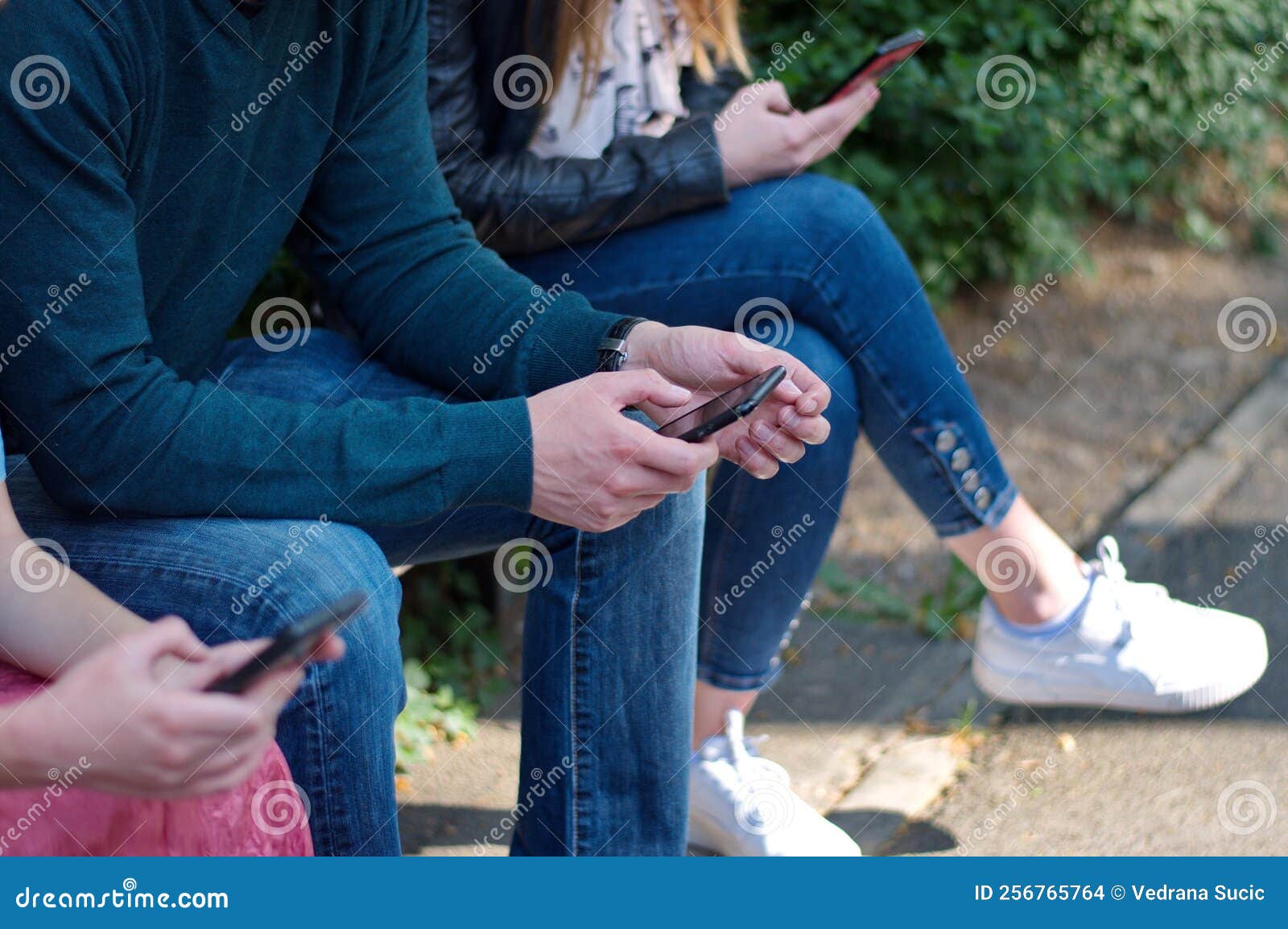 People using mobile phone stock photo. Image of adult - 256765764