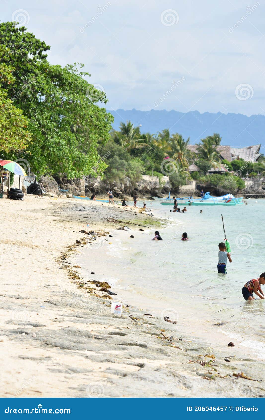 People Wading in Water at Tropical Beach Editorial Photography - Image ...