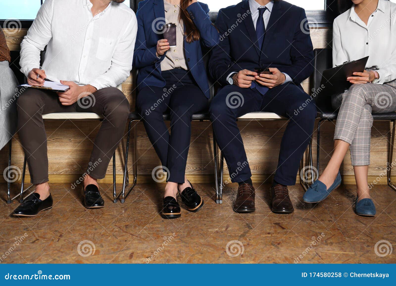 People Waiting for Job Interview in Office Hall, Closeup Stock Photo ...