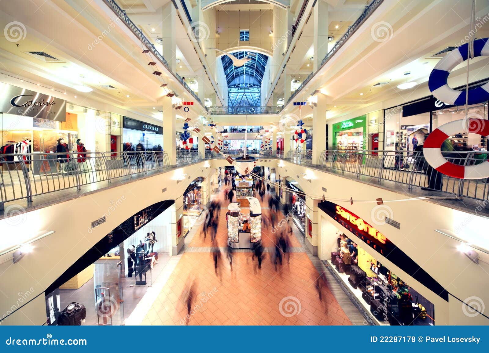 People walk in Atrium Mall editorial stock photo. Image of center ...