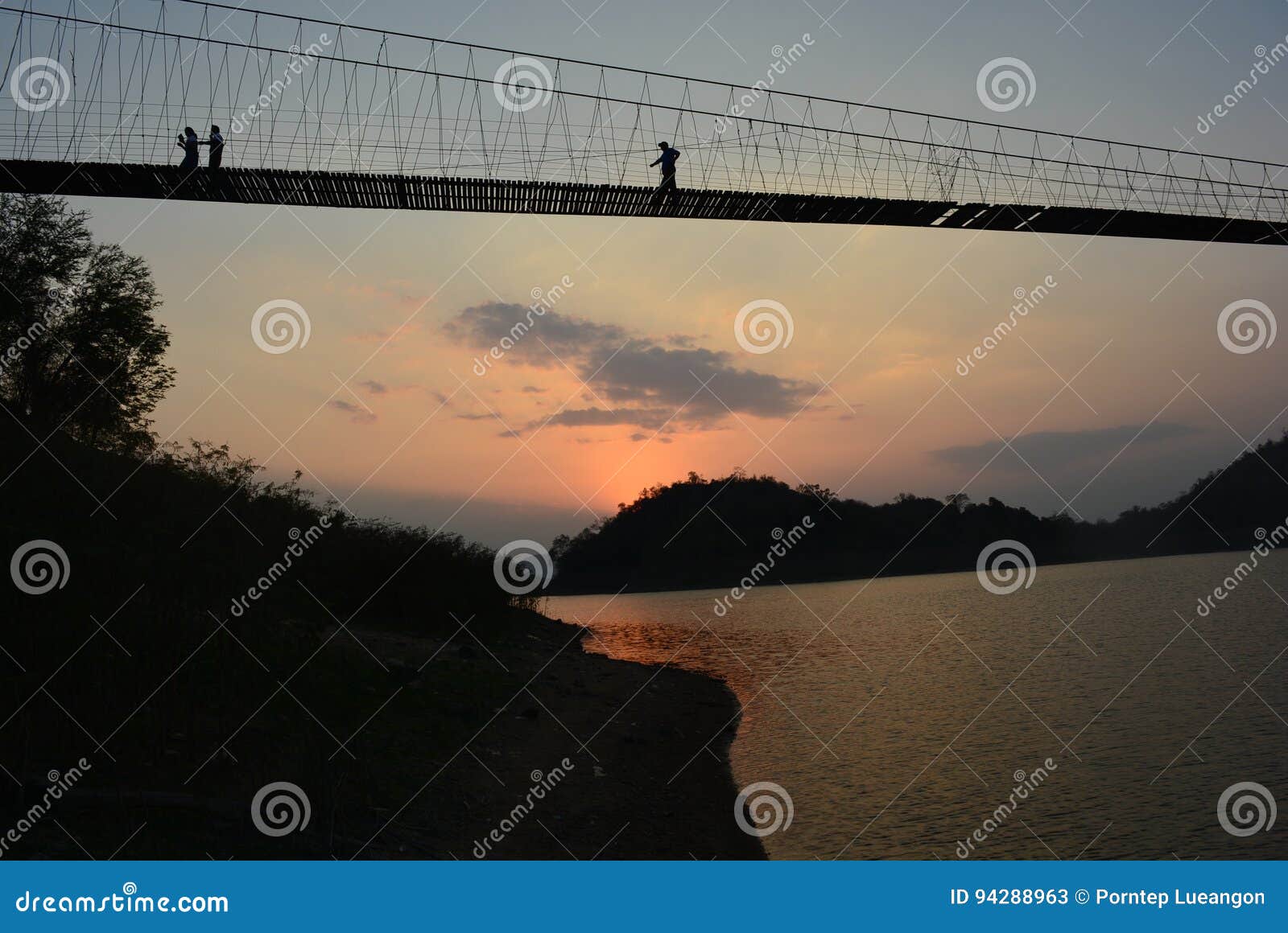People Walking Across the Bridge Stock Image - Image of walk, walking ...