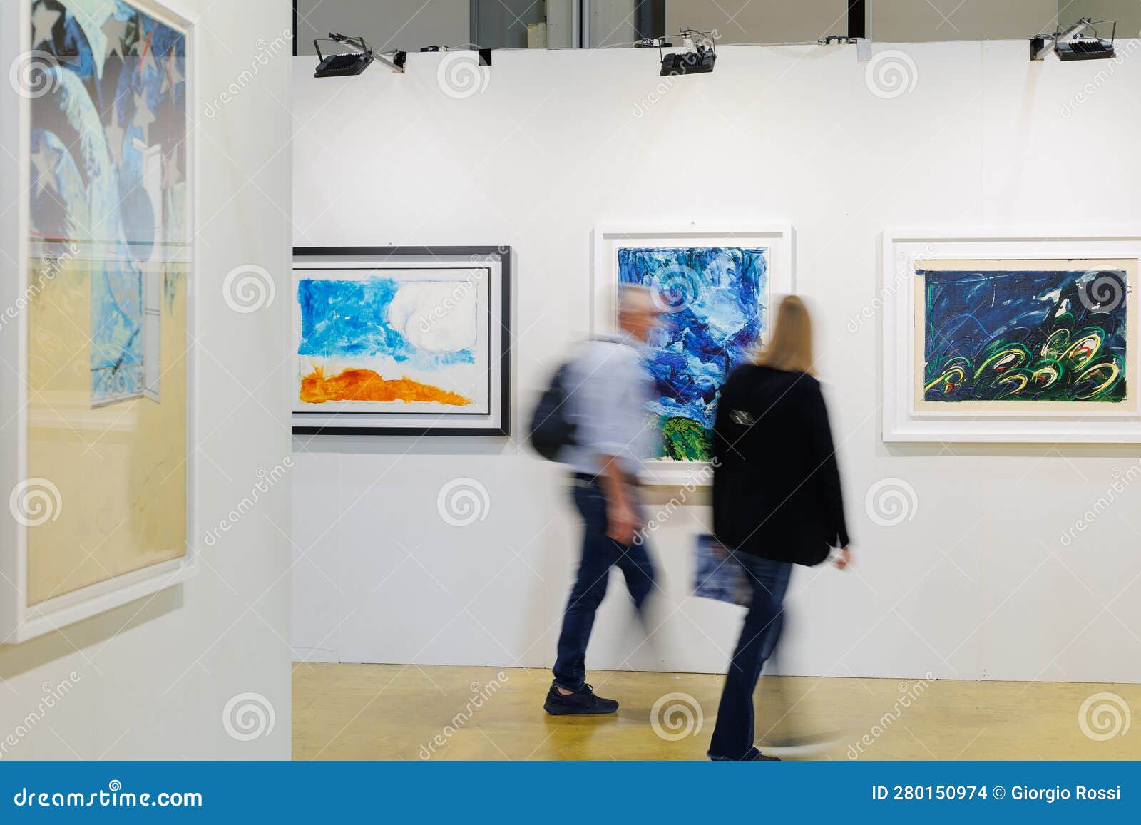 People Walking and Admiring Paintings in a Modern Art Gallery Editorial ...