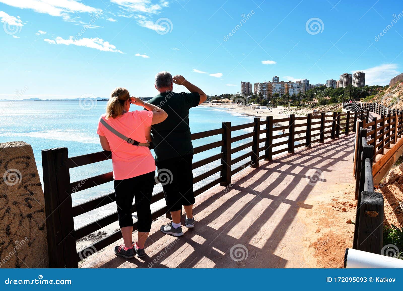 People Walking Along the Sea Stock Image - Image of pier, shore: 172095093