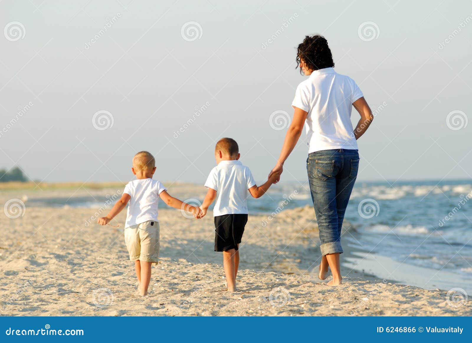 People walking on beach stock photo. Image of beautiful - 6246866