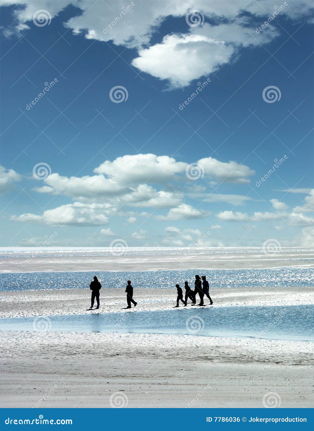 People Walking at the Beach Stock Photo - Image of clouds, season: 7786036