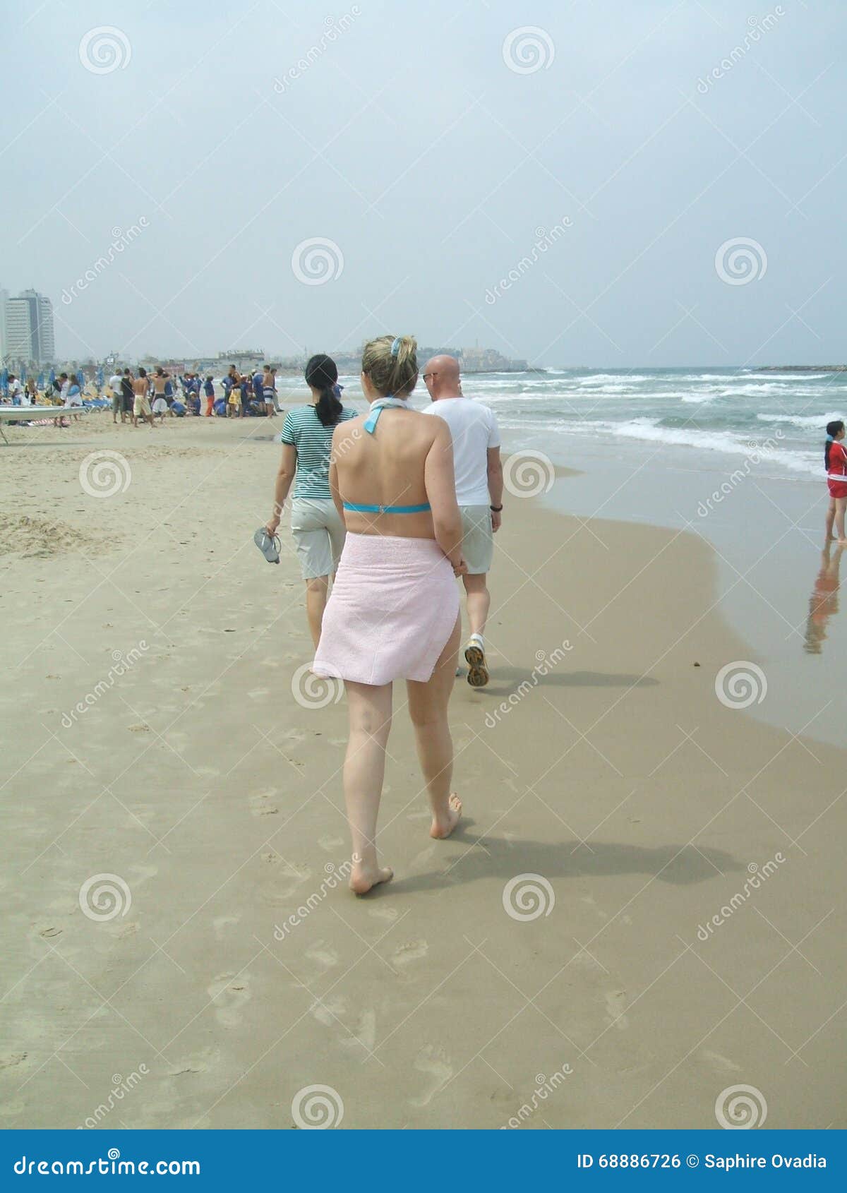 People walking on a beach editorial photo. Image of summer - 68886726