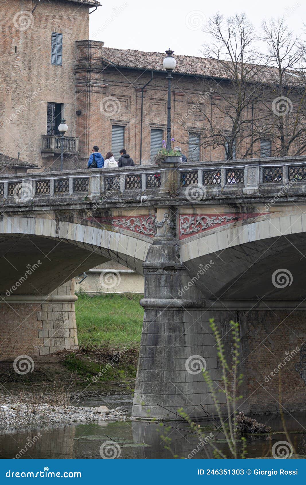 People Walking on the Bridge in the Center of Parma on a Spring Day ...