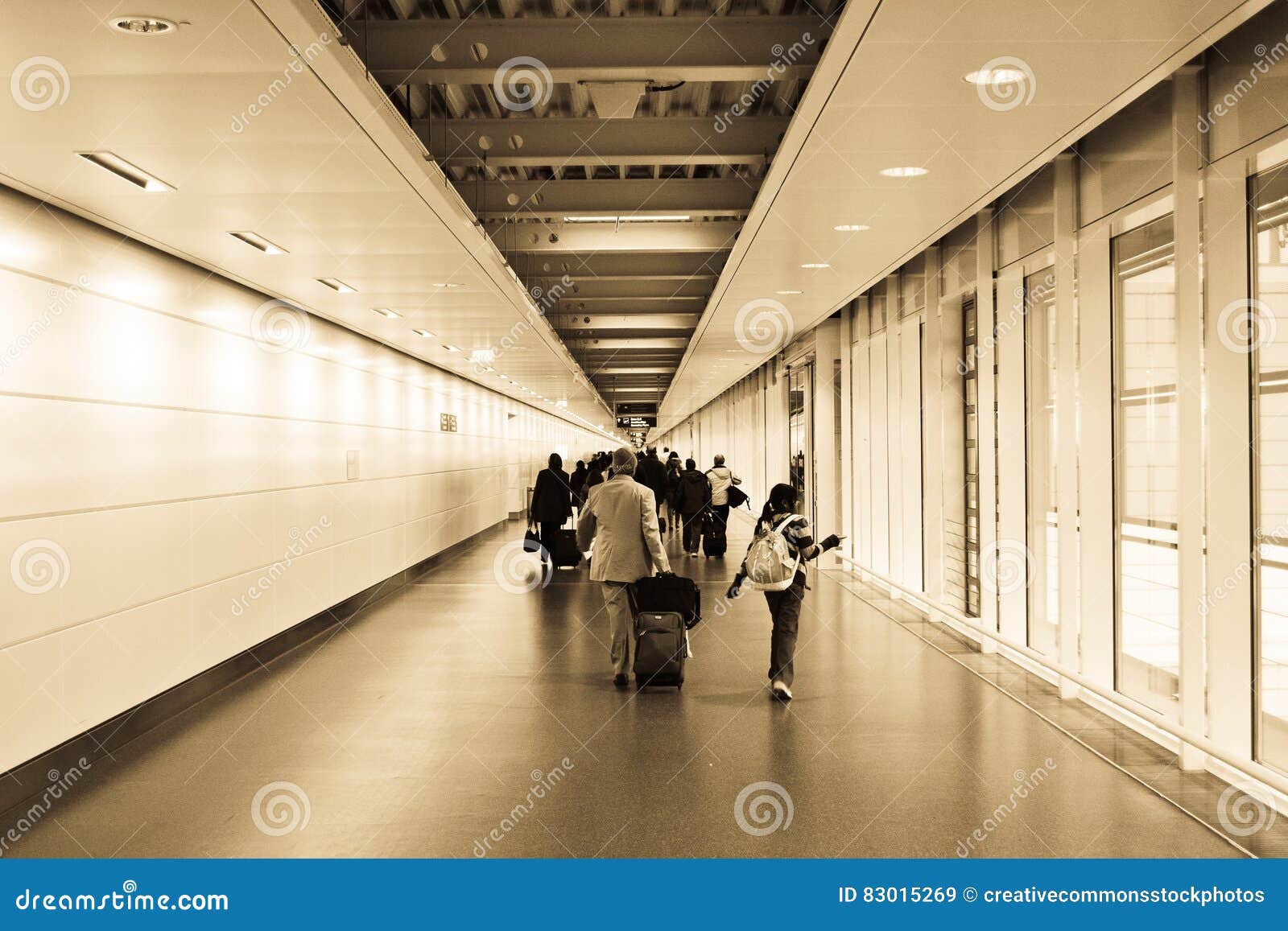 People Walking In The Hallway Inside The Building Picture. Image: 83015269