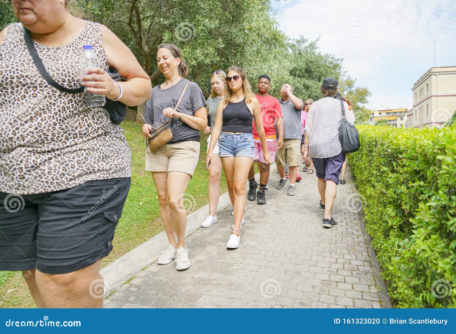 People Walking in Line Up and Down a Path Editorial Image - Image of ...