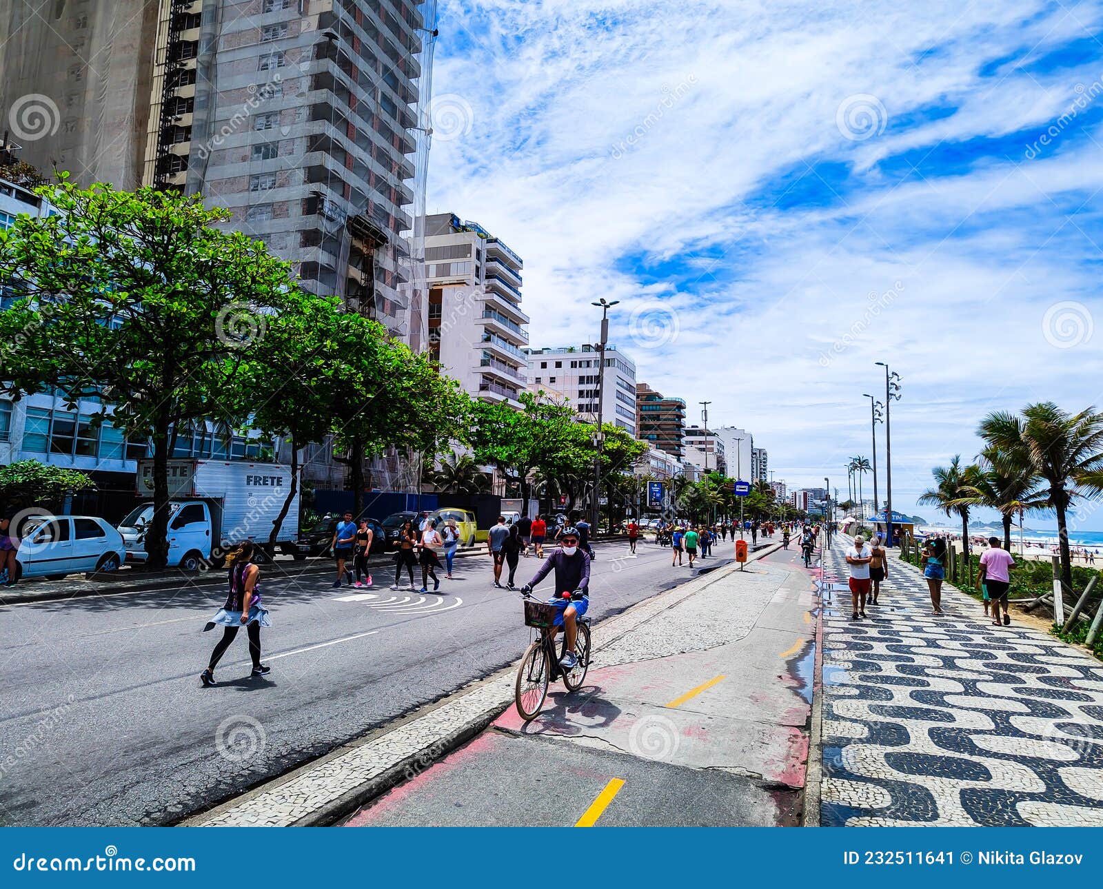 People Walking on the Promenade with Trees, Buildings Editorial Photo ...