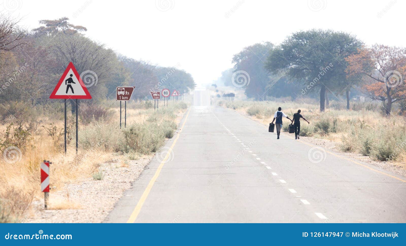 People Walking at the Side of the Road Editorial Photography - Image of ...