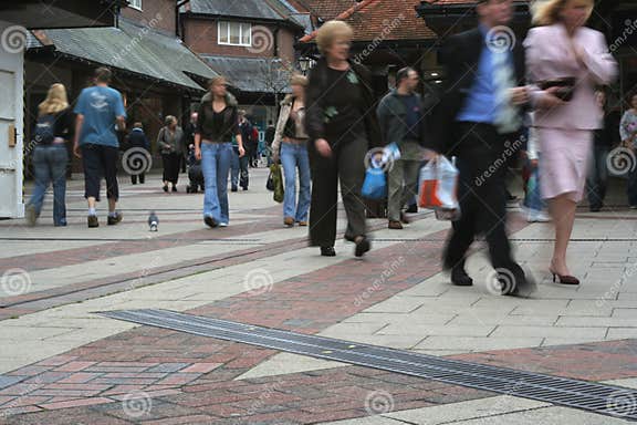 People walking on street stock photo. Image of blurry, adults - 455692