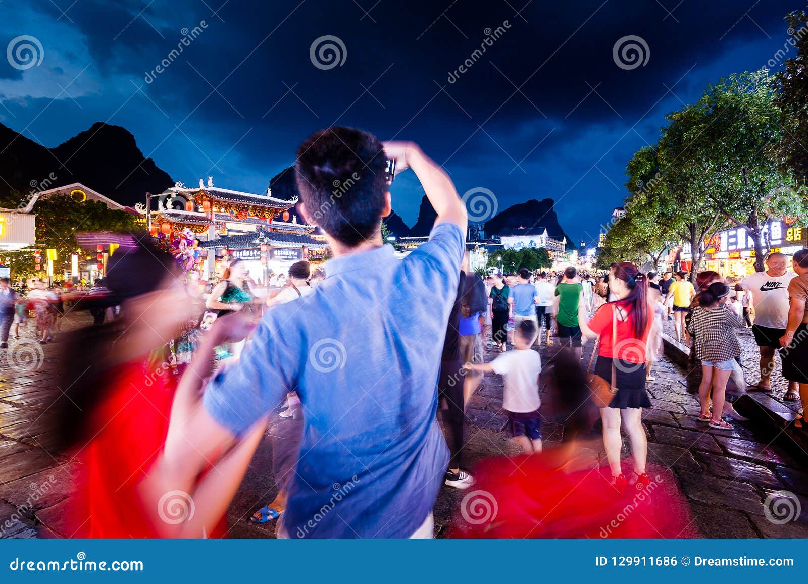 People Walking in Street, Dragging Shutter Editorial Photo - Image of ...
