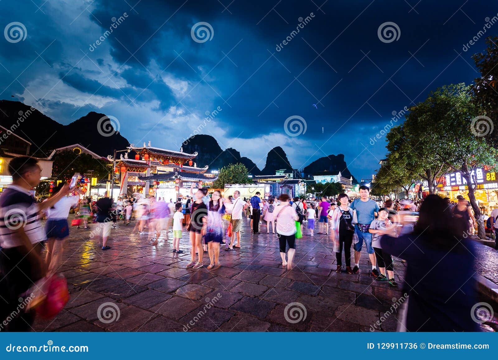 People Walking in Street, Dragging Shutter Editorial Photo - Image of ...