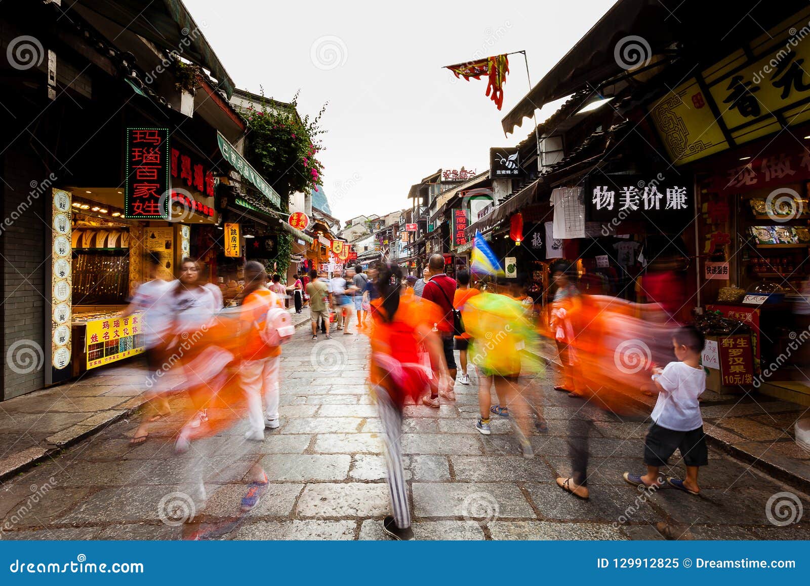 People Walking in Street, Dragging Shutter Editorial Image - Image of ...
