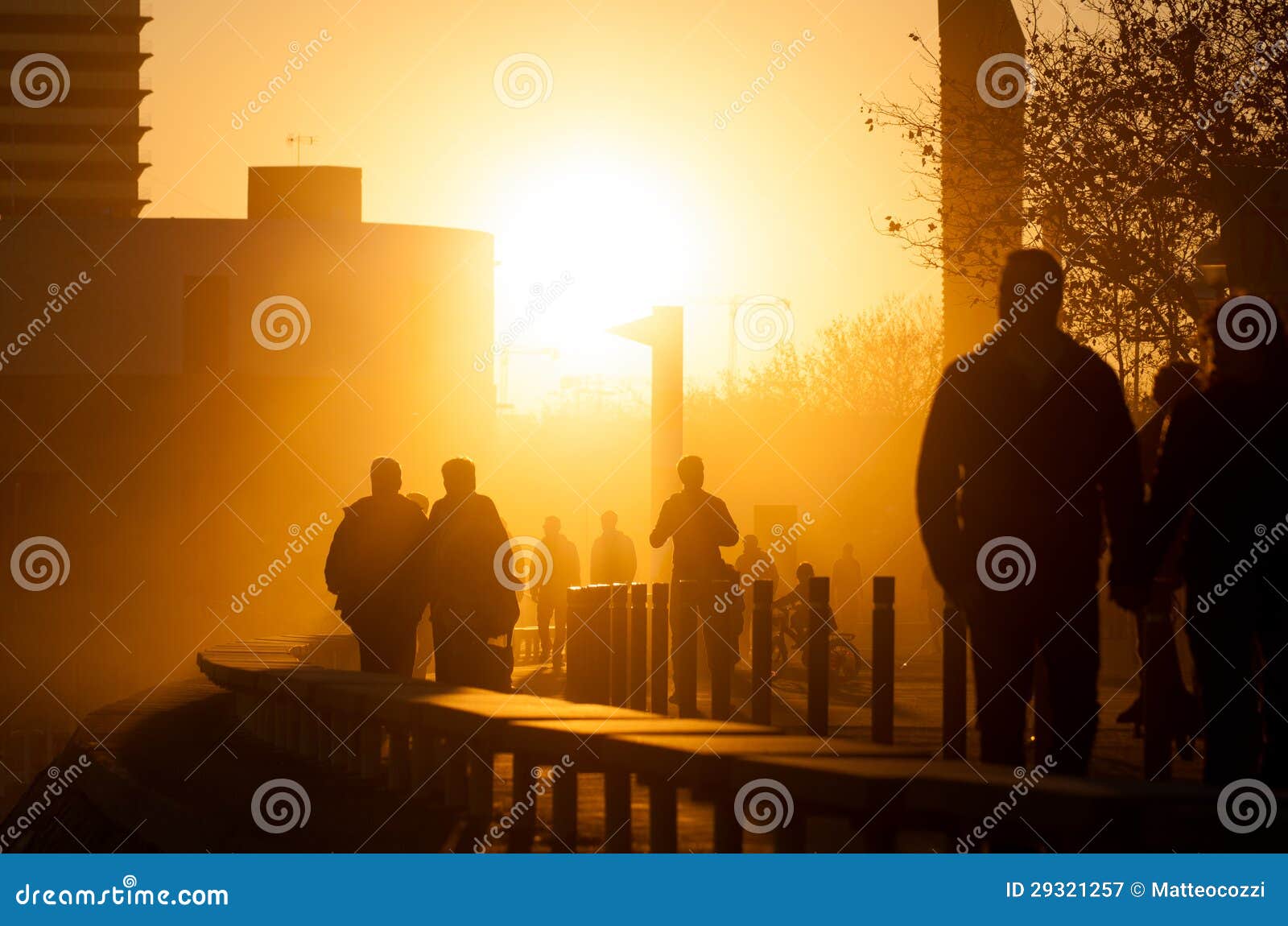 People walking at sunset stock image. Image of spain - 29321257